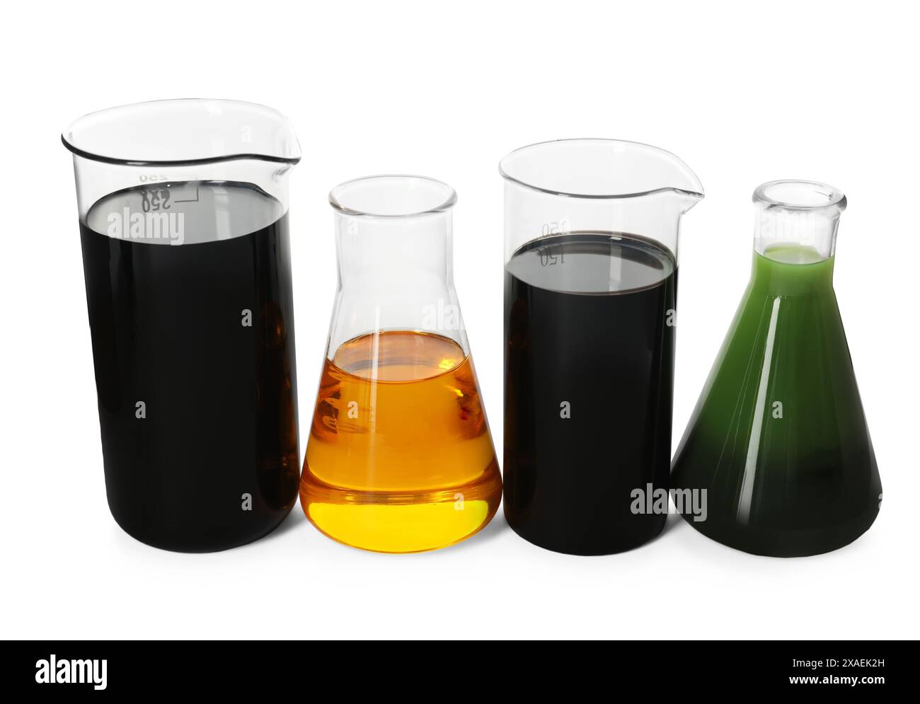Beakers and flasks with different types of oil isolated on white Stock ...