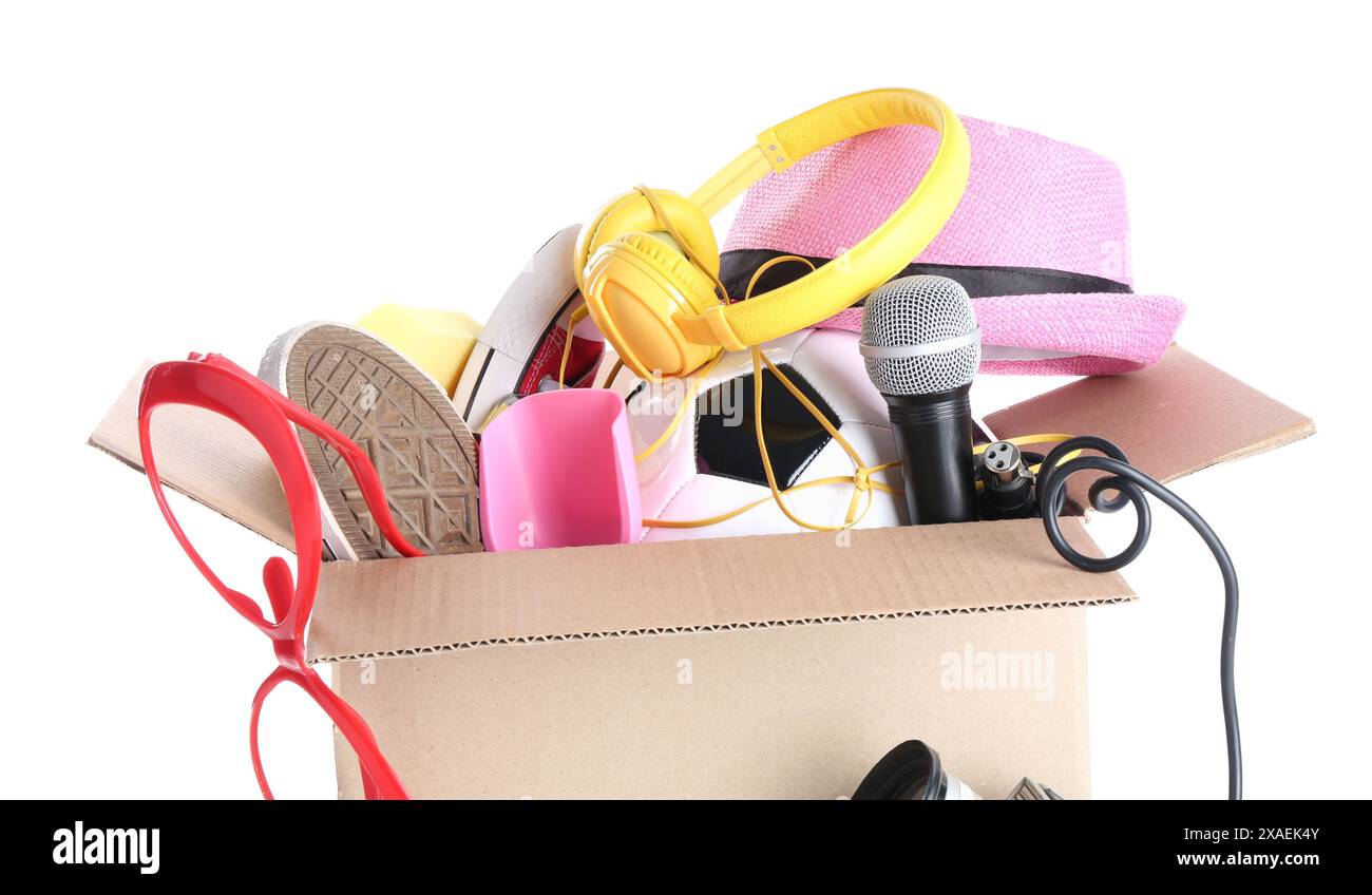 Box of unwanted stuff isolated on white Stock Photo - Alamy