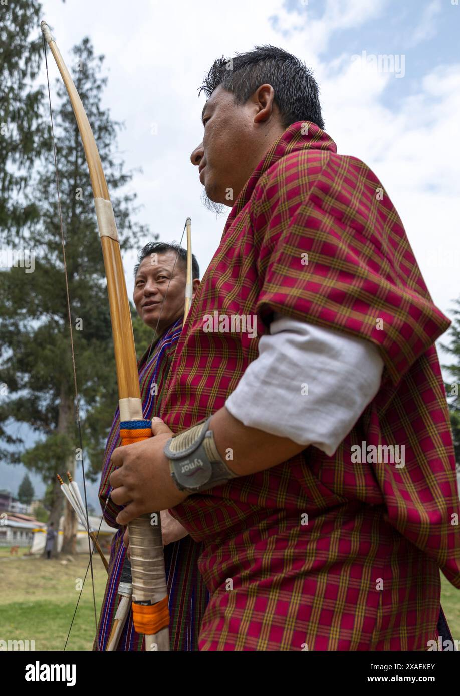 Bhutanese archers on an archery range, Chang Gewog, Thimphu, Bhutan ...