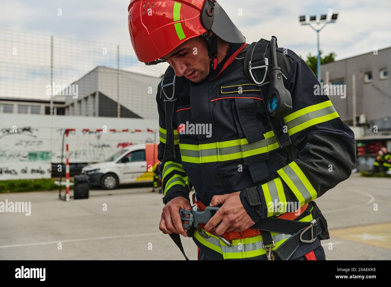 Professional Firefighter Suits Up in Full Gear for Duty Stock Photo - Alamy