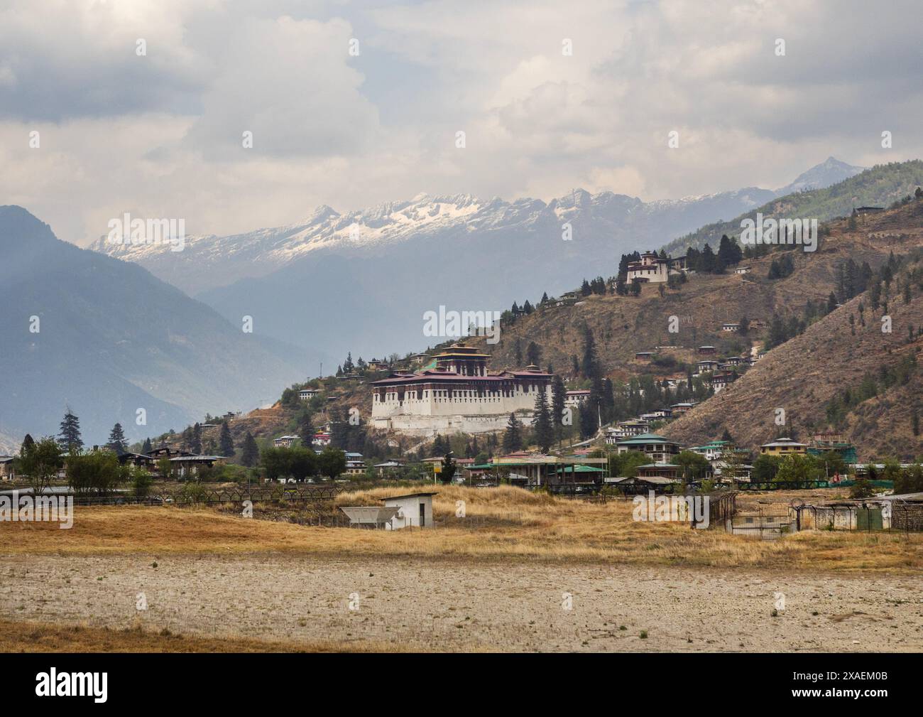 Dzong overlooking fields, Wangchang Gewog, Paro, Bhutan Stock Photo - Alamy