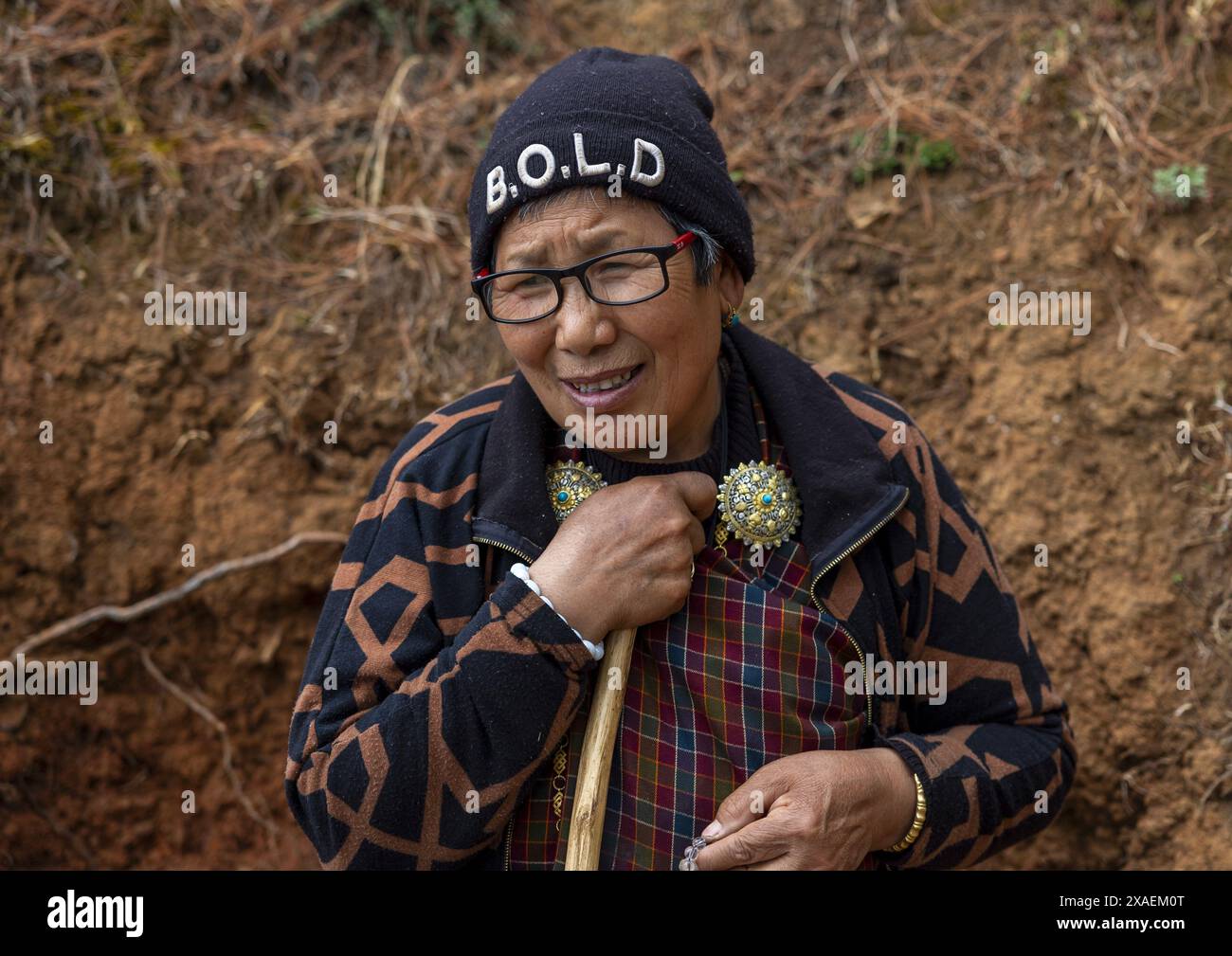 Bhutanese woman hiking in the mountain, Paro, Drakarpo, Bhutan Stock ...