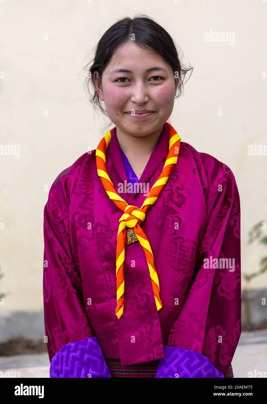 Portrait of a bhutanese teenage girl in kira, Chang Gewog, Thimphu ...