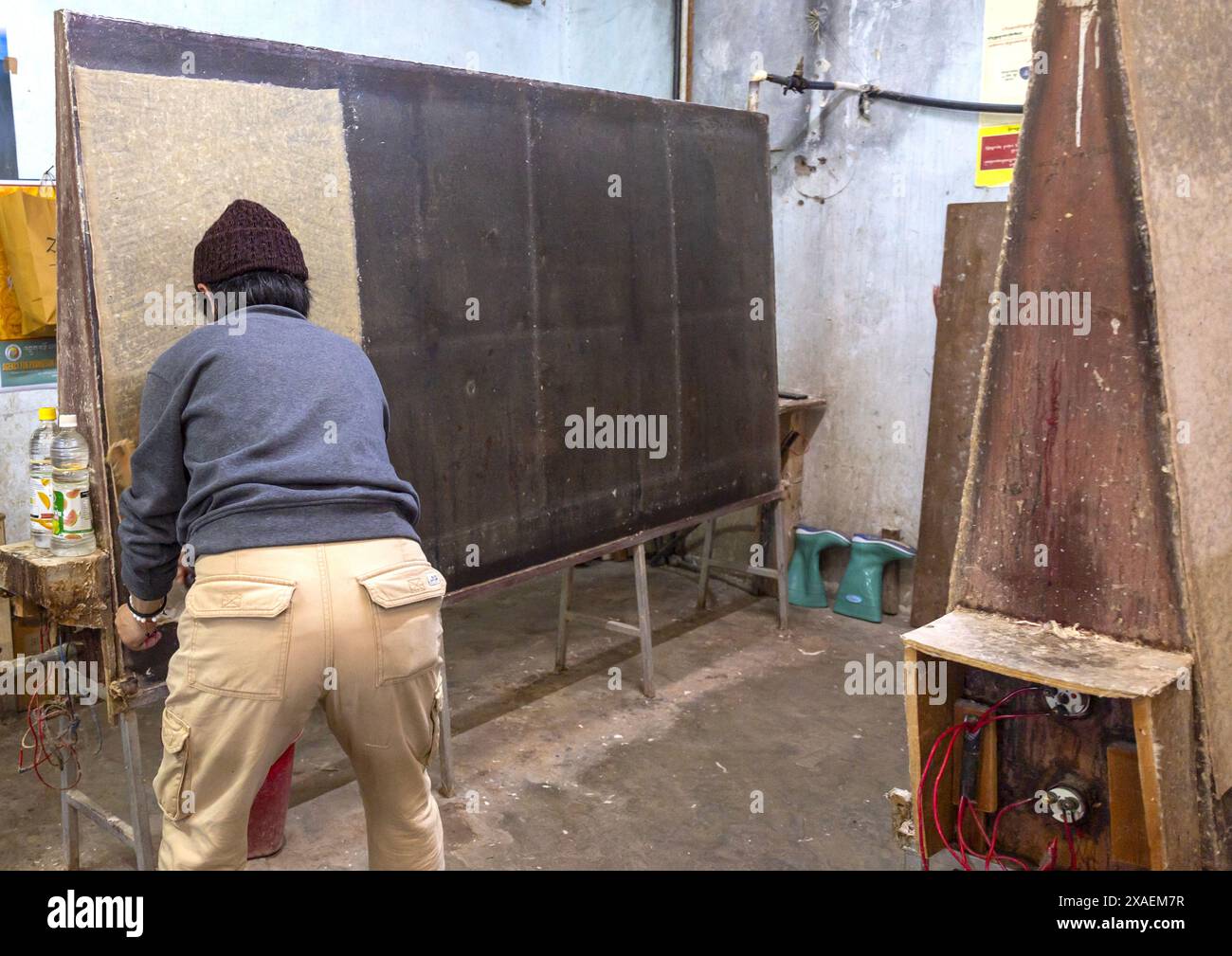 Bhutanese man drying traditional paper, Chang Gewog, Thimphu, Bhutan ...