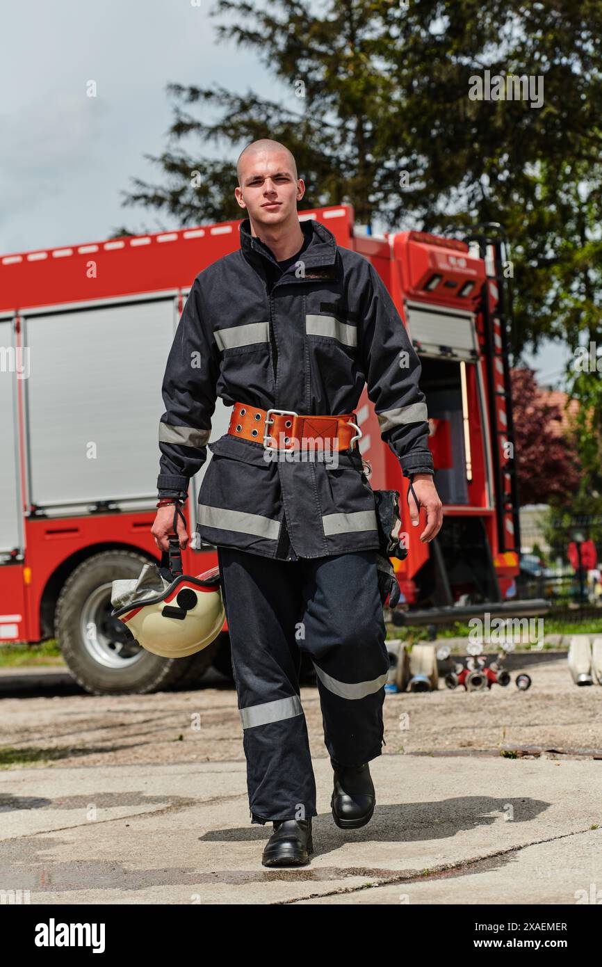 Firefighter Stands Proudly with Professional Gear Beside Fire Truck ...