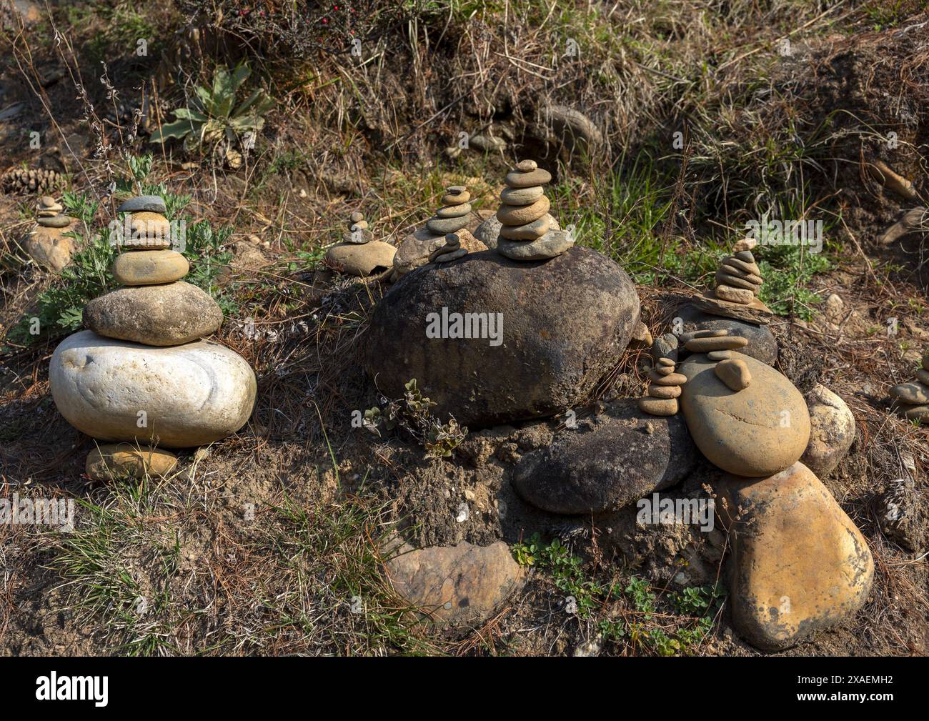 Prayer stone stack pyramid, Bumthang, Mo Chhu, Bhutan Stock Photo - Alamy