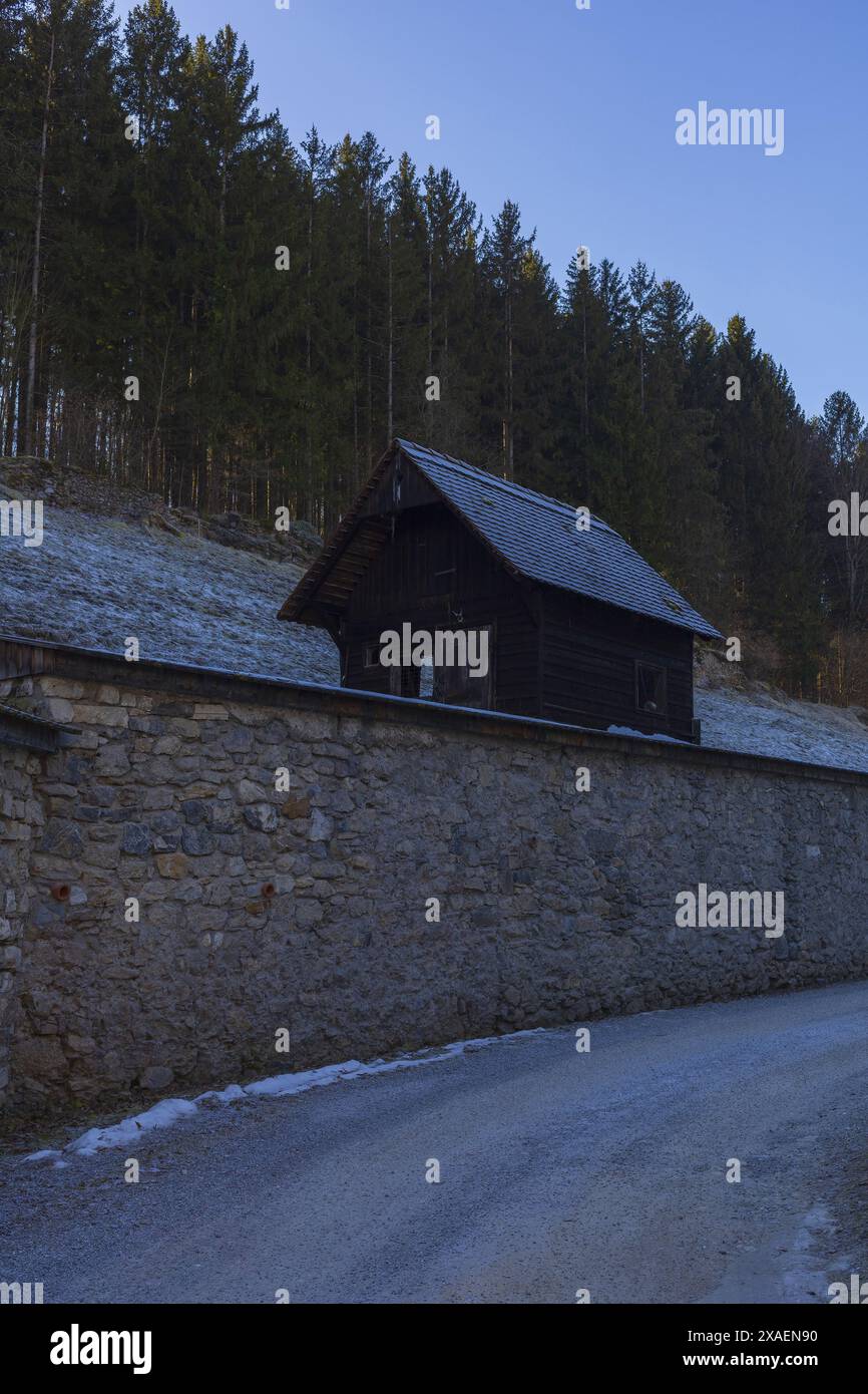 photography of a small wooden hut under the Alps on sunny winter ...