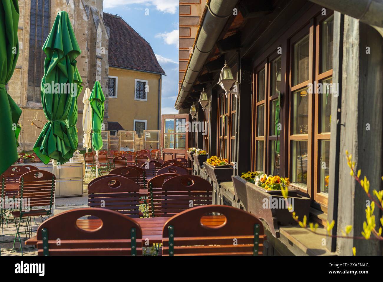 photography of a terrace of a traditional rural restaurant with brown ...