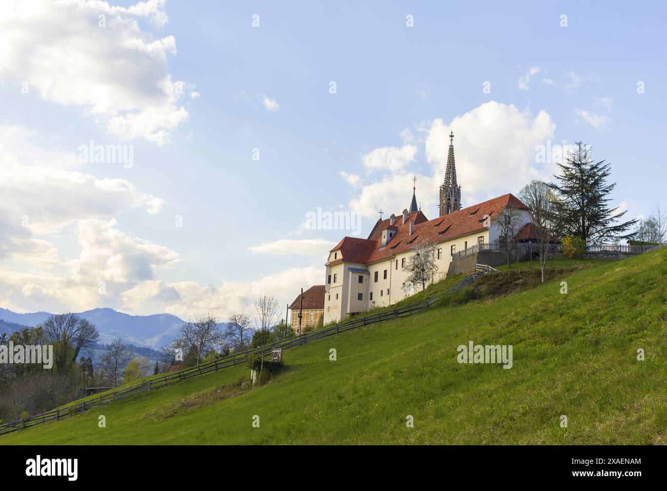 panoramic photography of a white castle and church on a green hill in ...