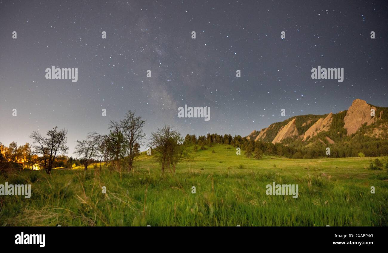 Milky Way over the beautiful mountains and blue sky at night in summer ...