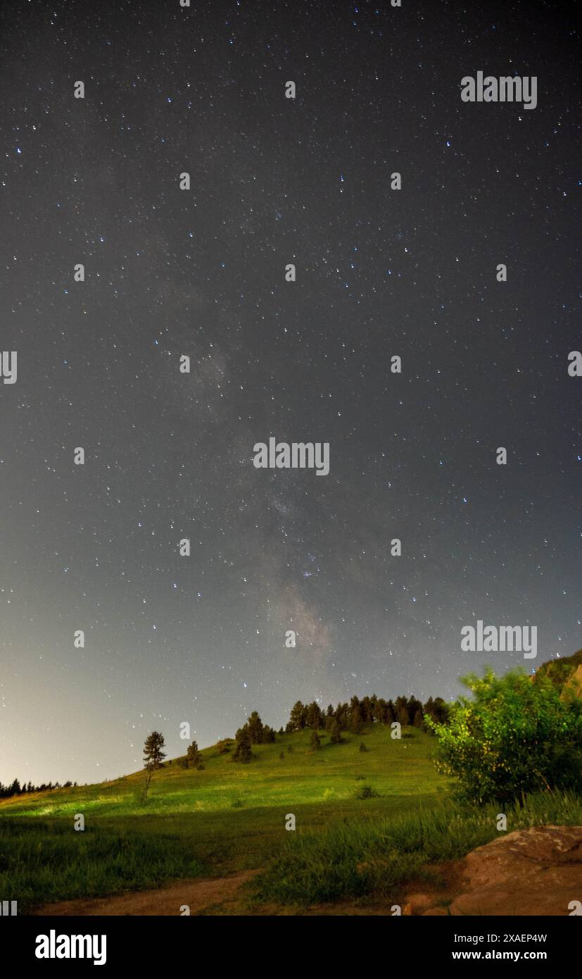 Milky Way over the beautiful mountains and blue sky at night in summer ...