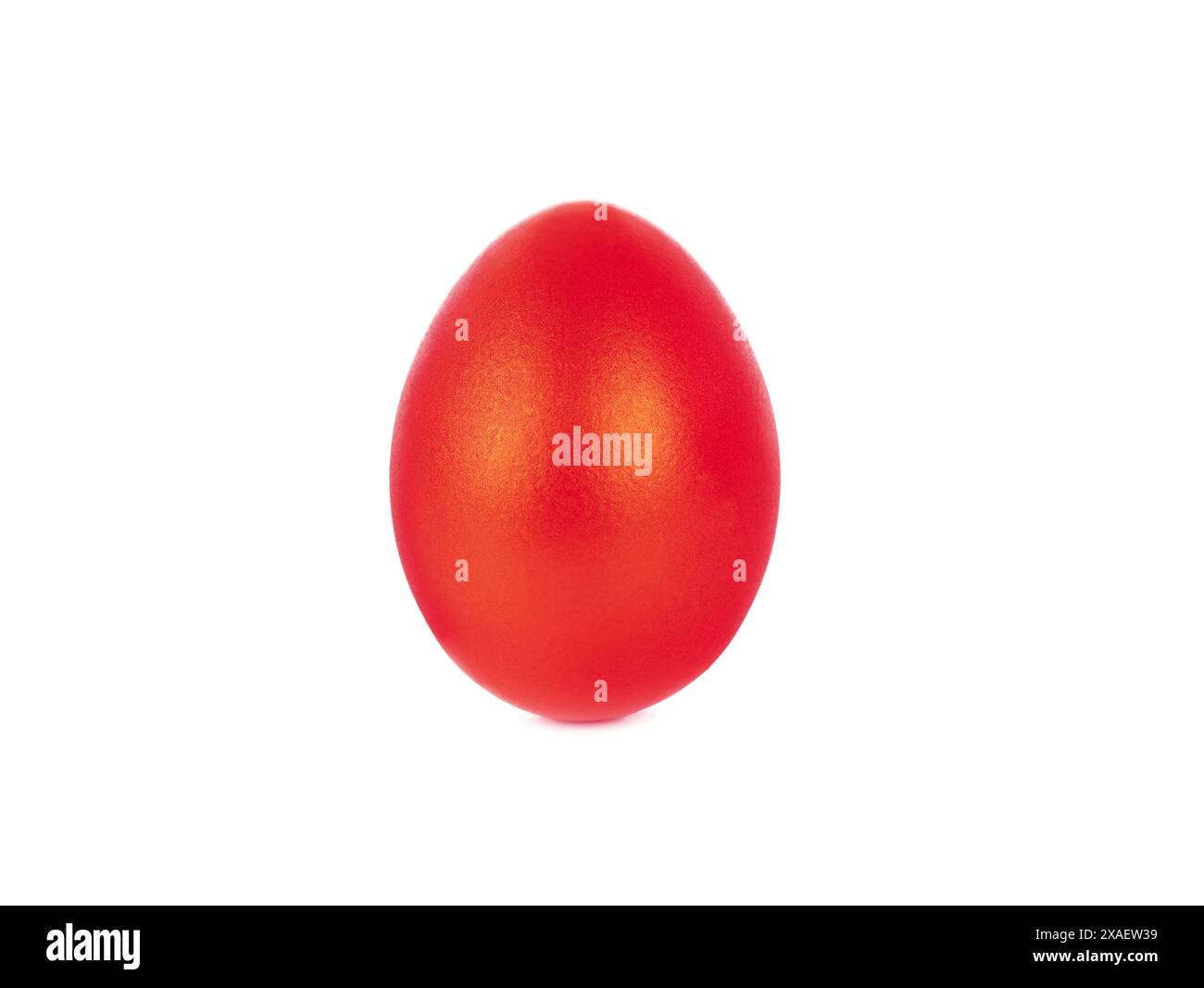 red egg on a white background Stock Photo - Alamy