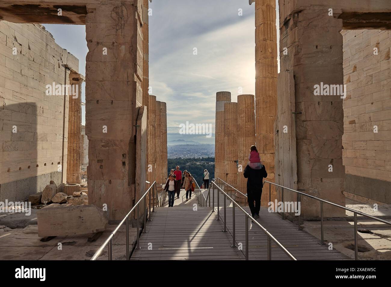 Acropolis of Athens, entrance gate pillars with tourists Stock Photo ...