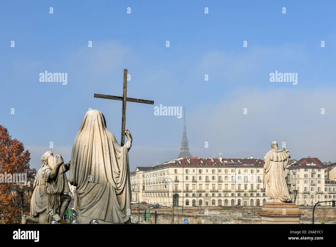 Back of the statue "Religion", the top of the Mole Antonelliana and the ...