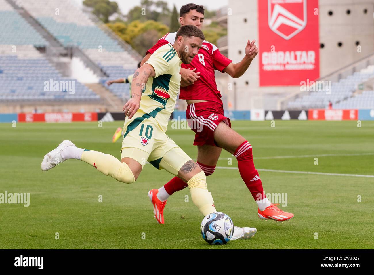 ALGARVE, PORTUGAL - 06 JUNE 2024: Wales' Wes Burns and Gibraltar's ...