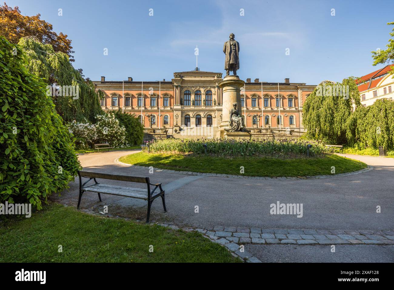 In front of the Uppsala university Main Building stands the monument to ...
