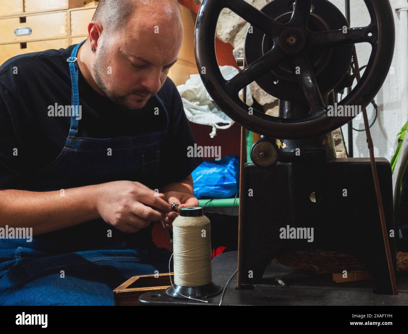 Shoemaker hands sewing machine hi-res stock photography and images - Alamy
