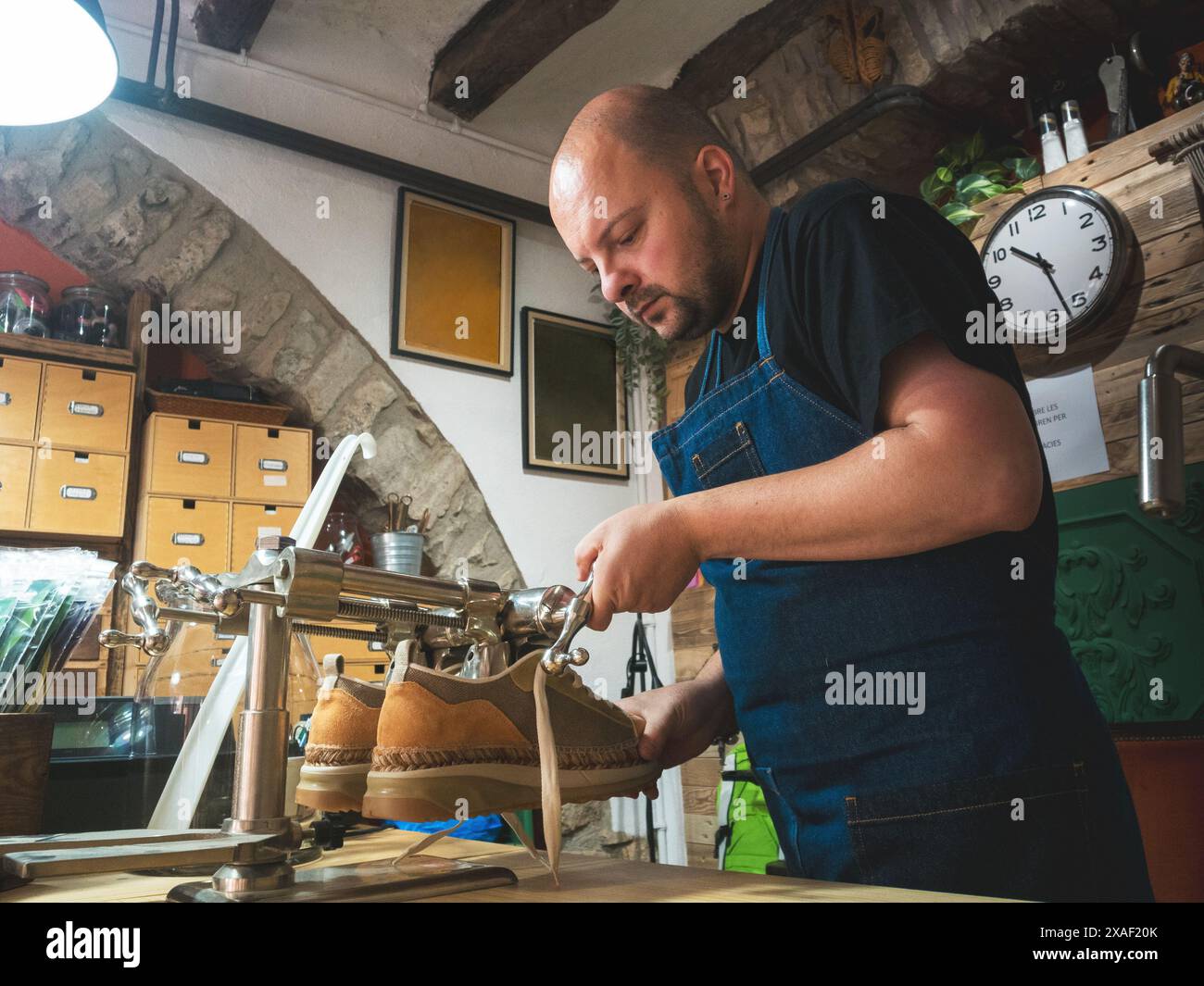 Repairing shoes hi-res stock photography and images - Alamy