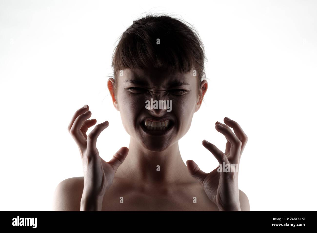 This powerful image captivates a young woman in distress, showing ...