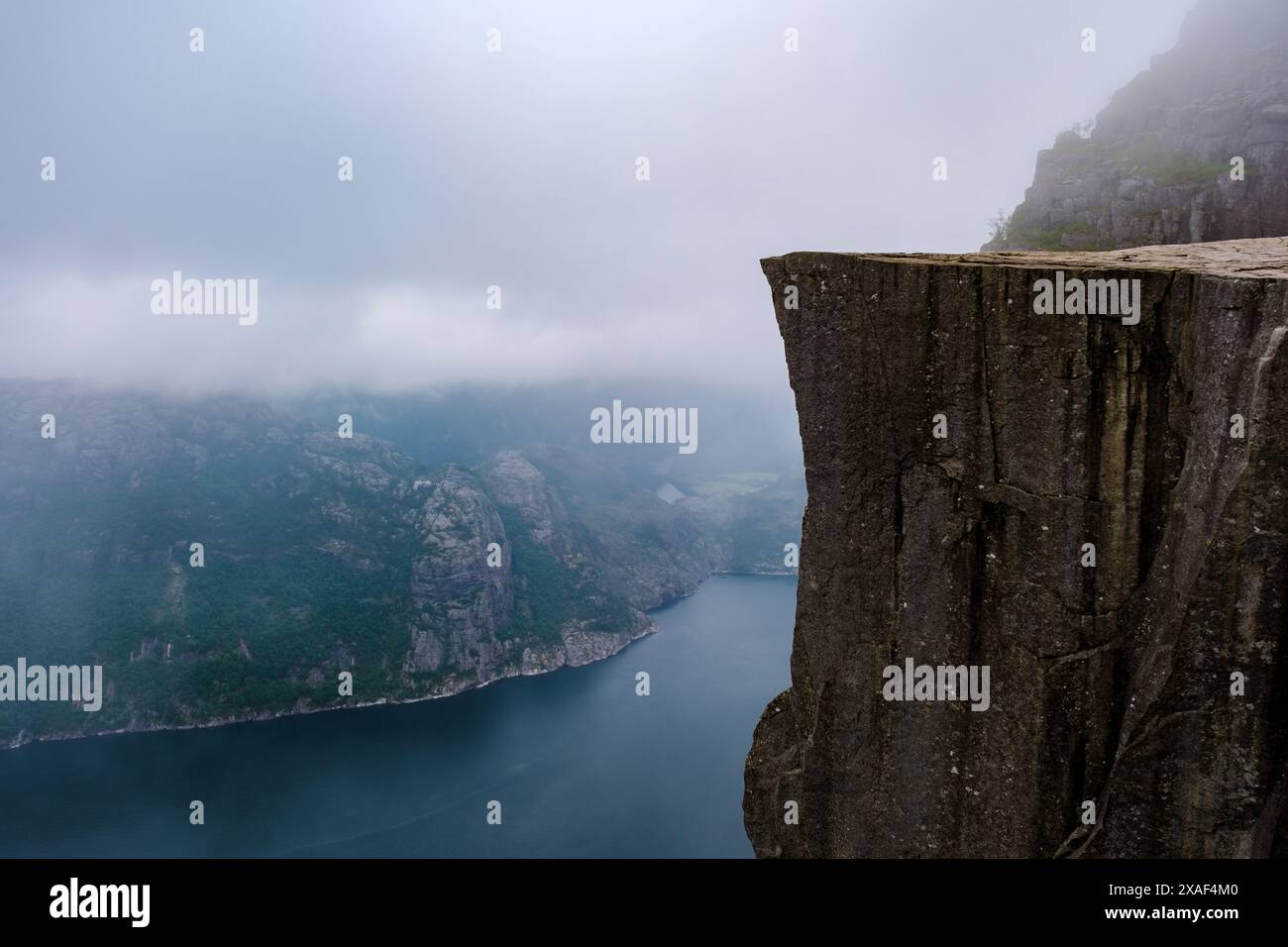 Preikestolen, Norway A breathtaking view of a towering cliff ...