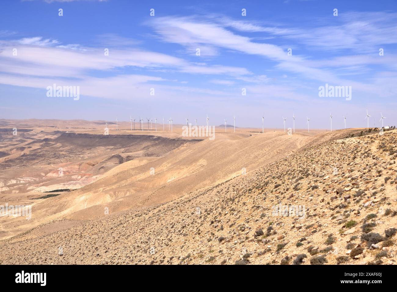 Wind turbine farm in remote arid desert environment generating ...