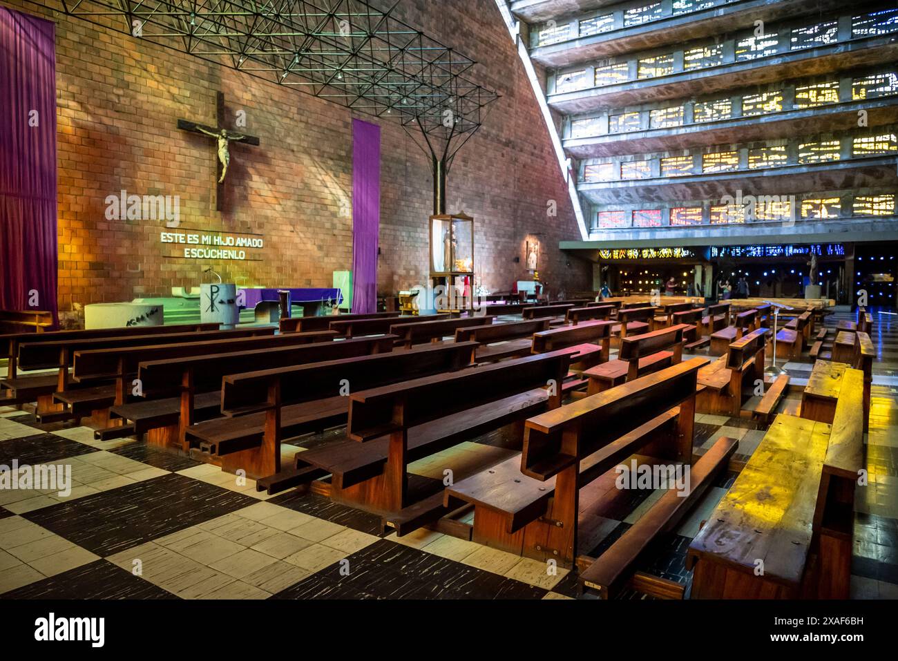 Main altar in the Colourful interior of El Rosario Church, a modernist ...