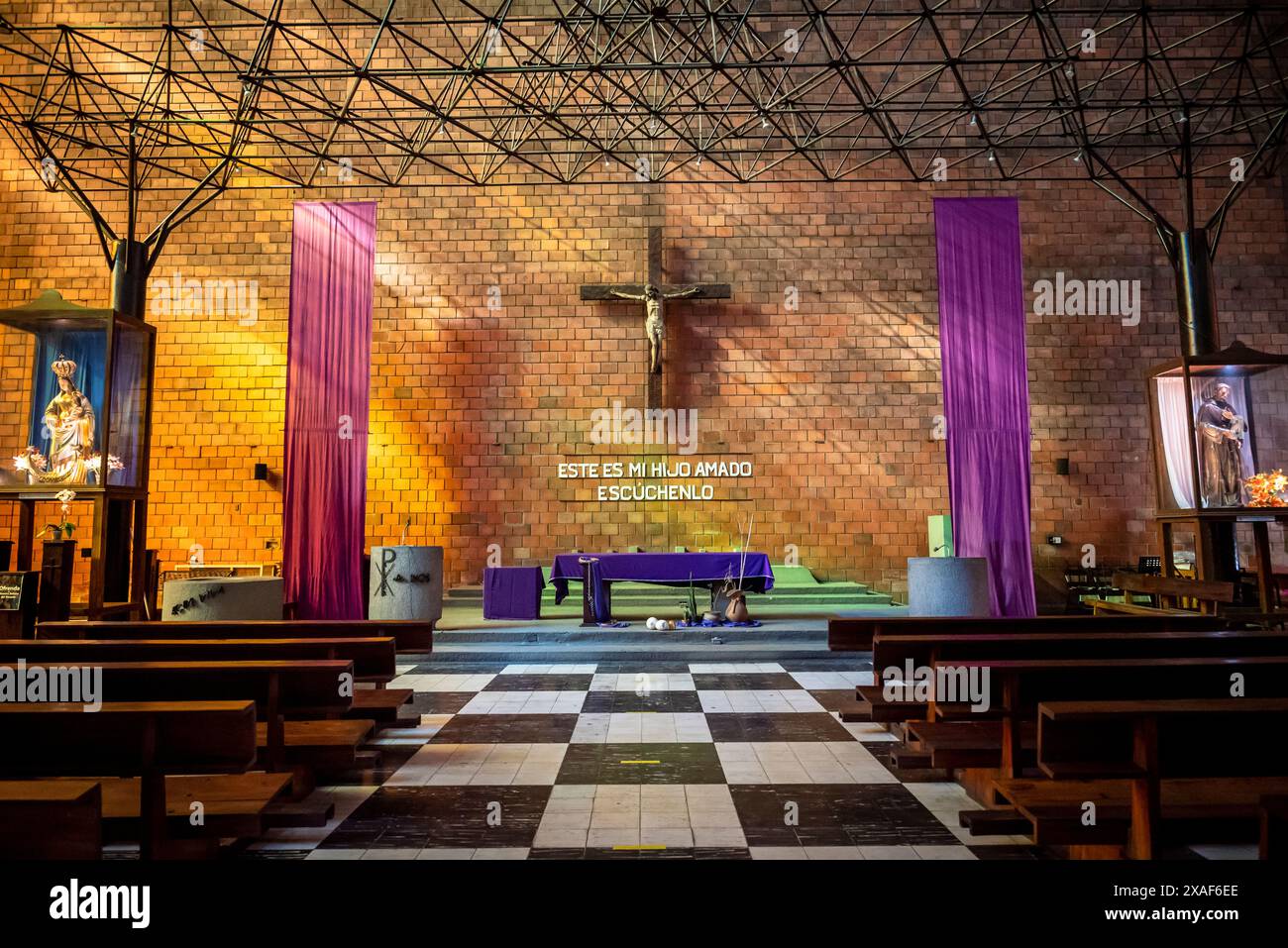 Main altar in the Colourful interior of El Rosario Church, a modernist ...