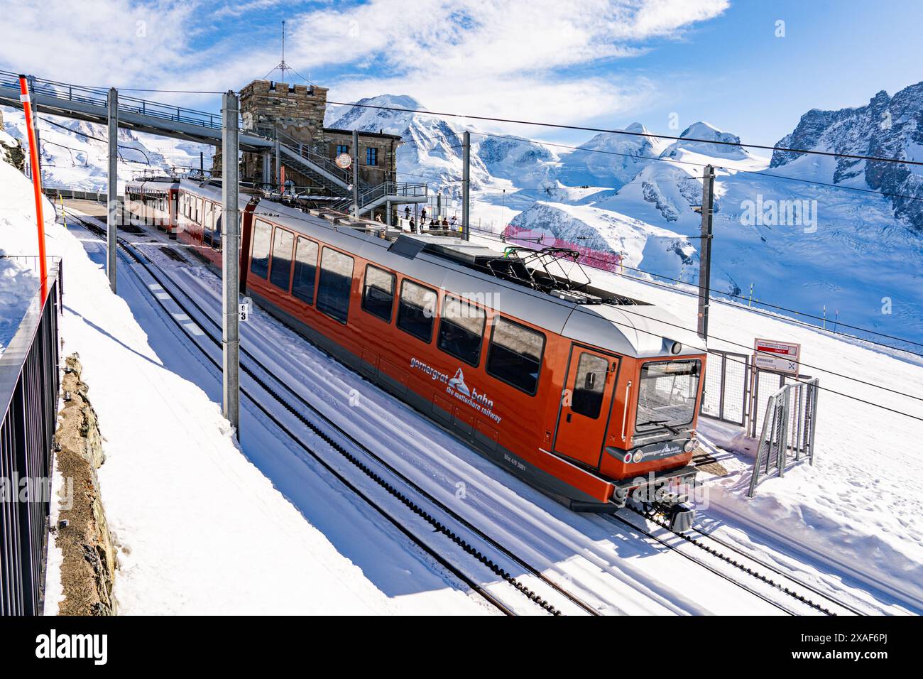Cogwheel train of the Gornergrat Railway descending a steep slope at ...