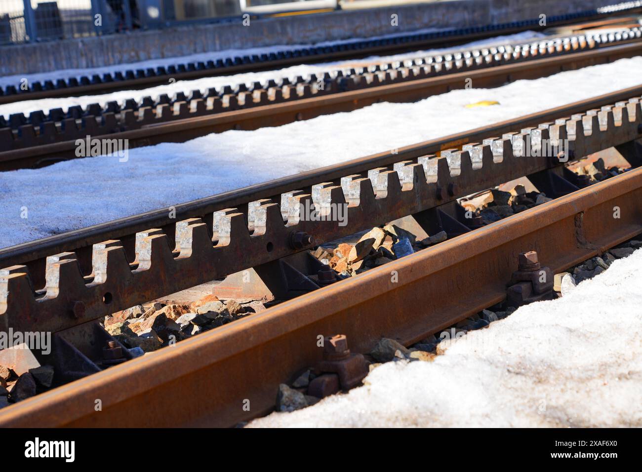Cogwheel railroad equipped with a rack rail using the Abt system with 2 solid bars with offset ...