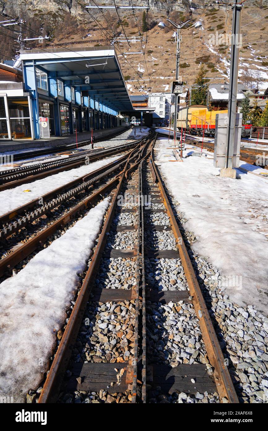 Cogwheel railroad equipped with a rack rail using the Abt system with 2 solid bars with offset ...