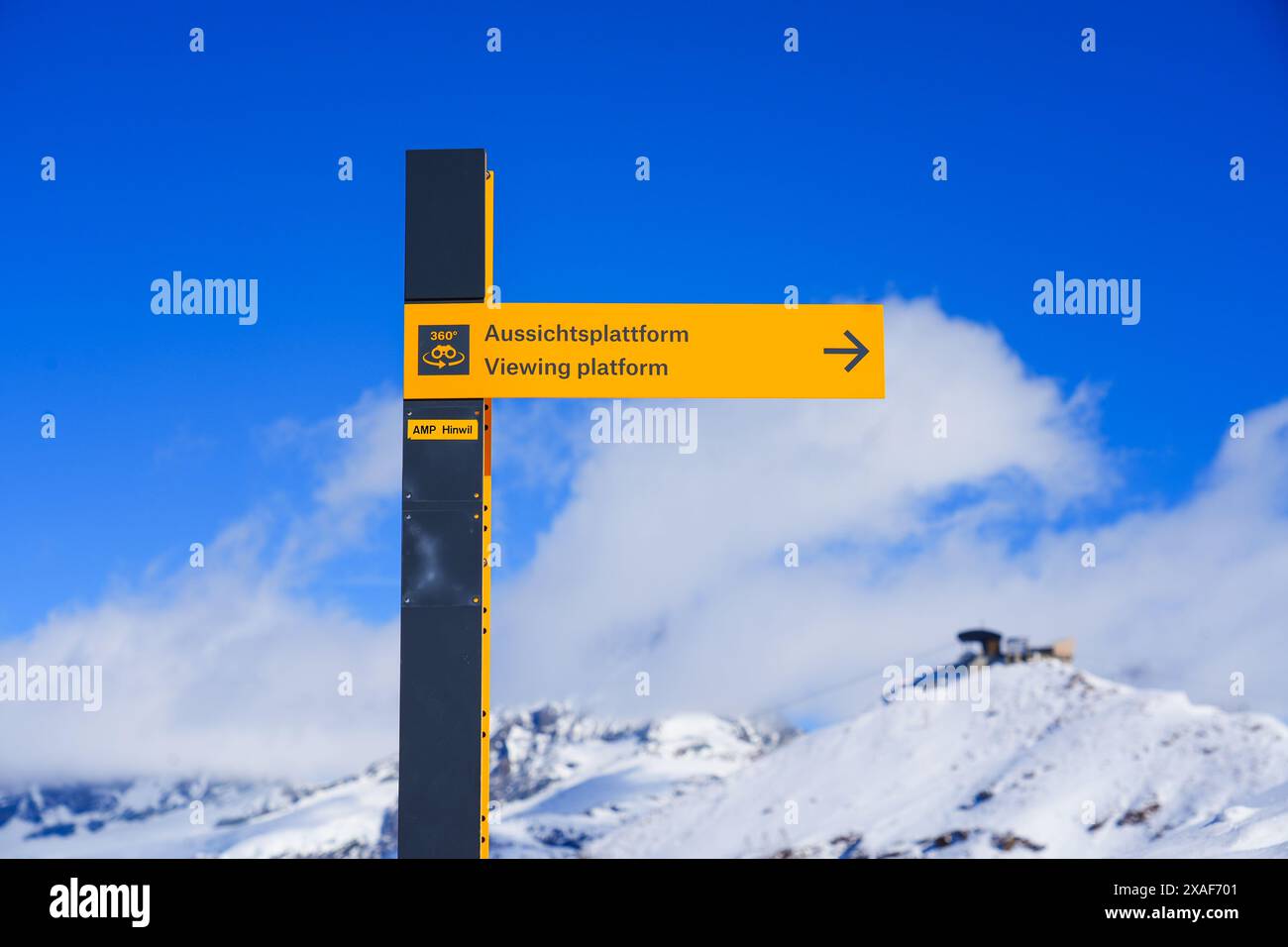 Yellow directional sign pointing at the viewing platform of the ...