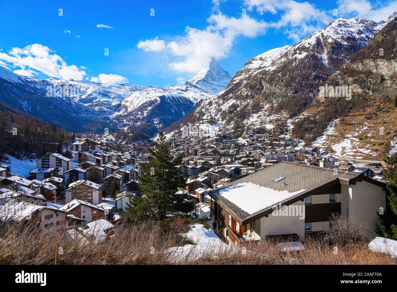 Aerial view of the village of Zermatt overlooked by the Matterhorn peak ...