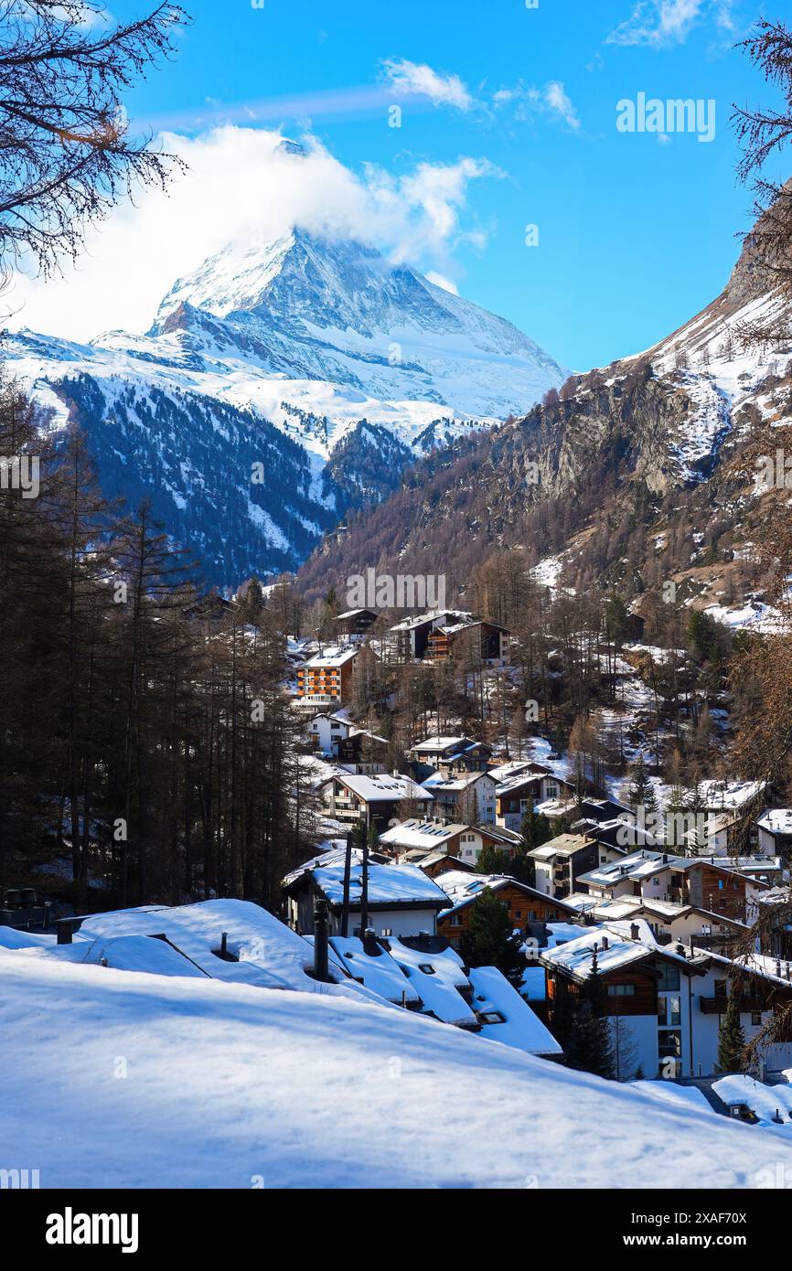 Aerial view of the village of Zermatt overlooked by the Matterhorn peak ...