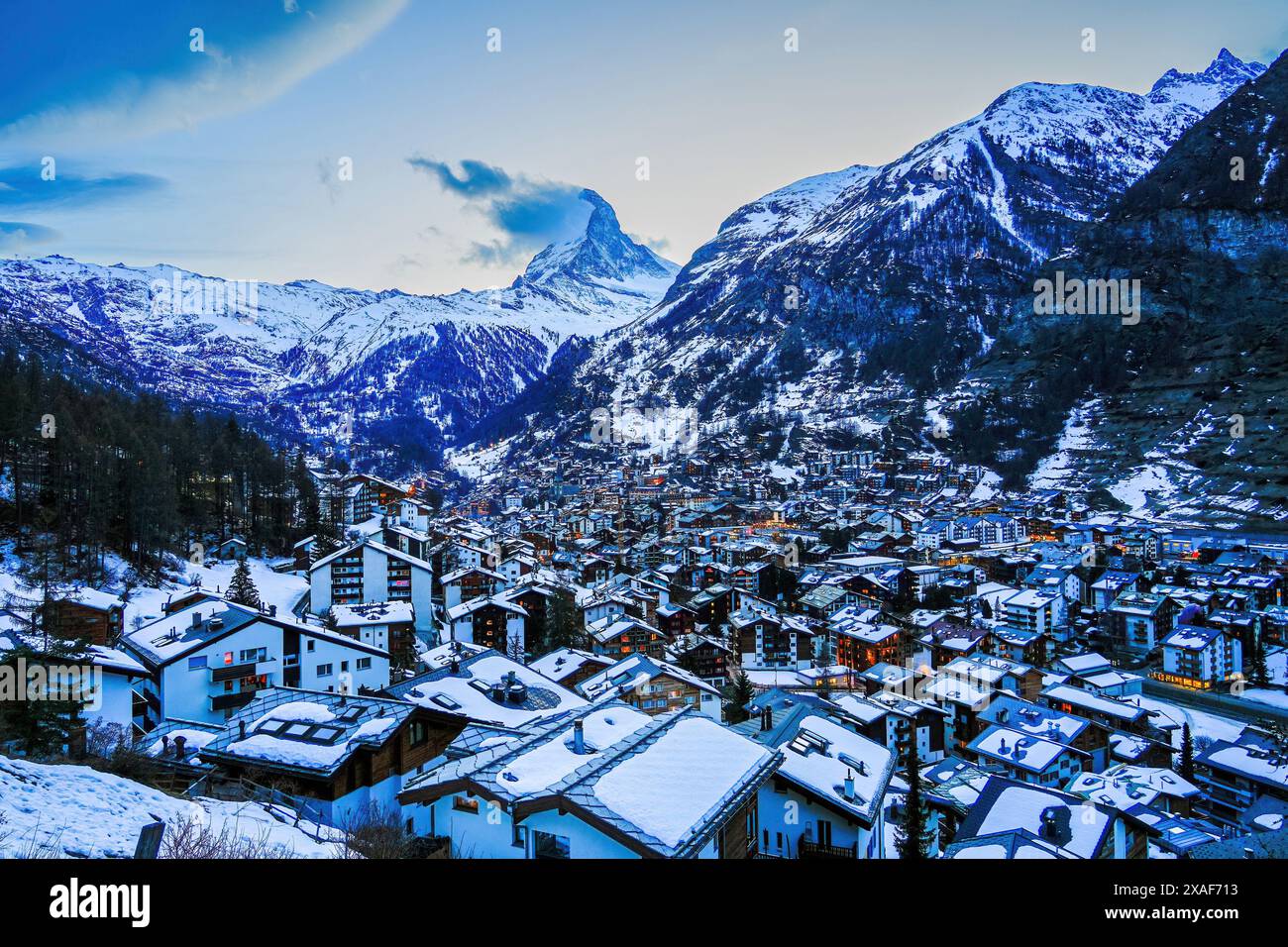 Aerial view of the village of Zermatt overlooked by the Matterhorn peak ...
