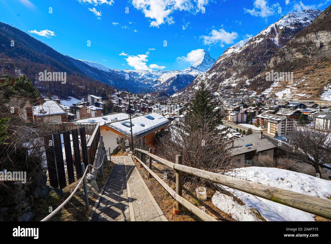 Pathway leading to a viewpoint above the village of Zermatt overlooked ...