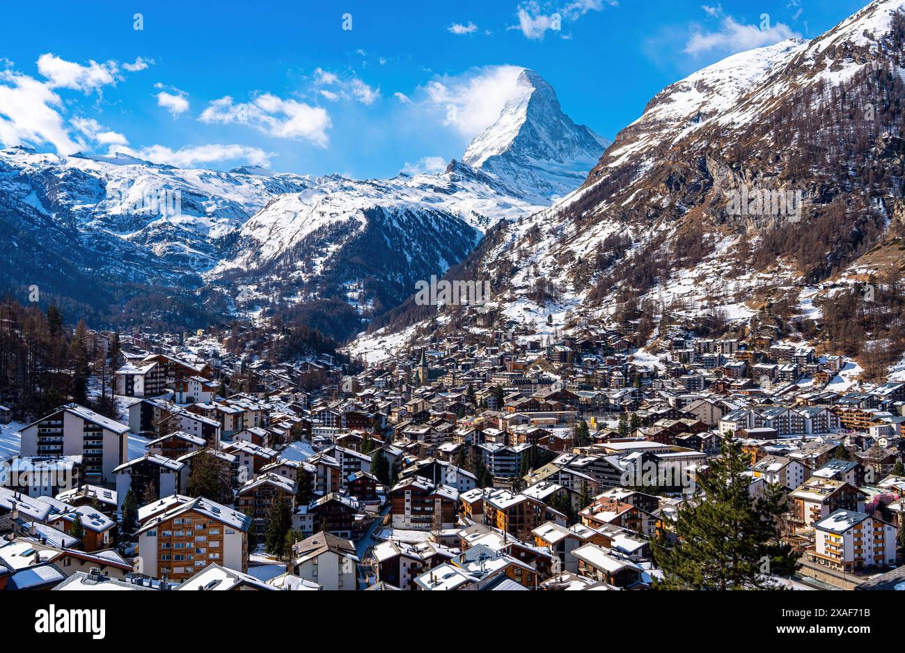 Aerial view of the village of Zermatt overlooked by the Matterhorn peak ...