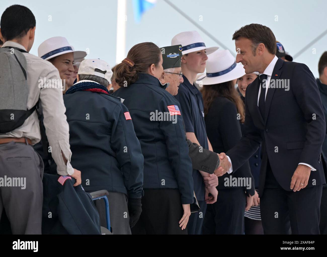 The President of France Emmanuel Macron (right) meets with veterans ...