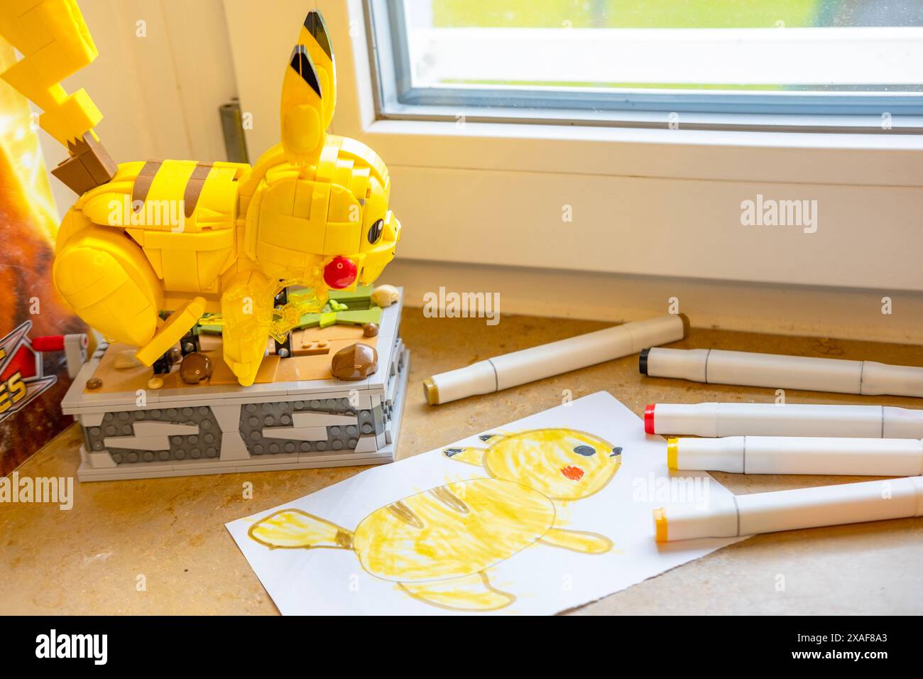 yellow colorful drawing figure Pikachu from LEGO pieces, construction ...