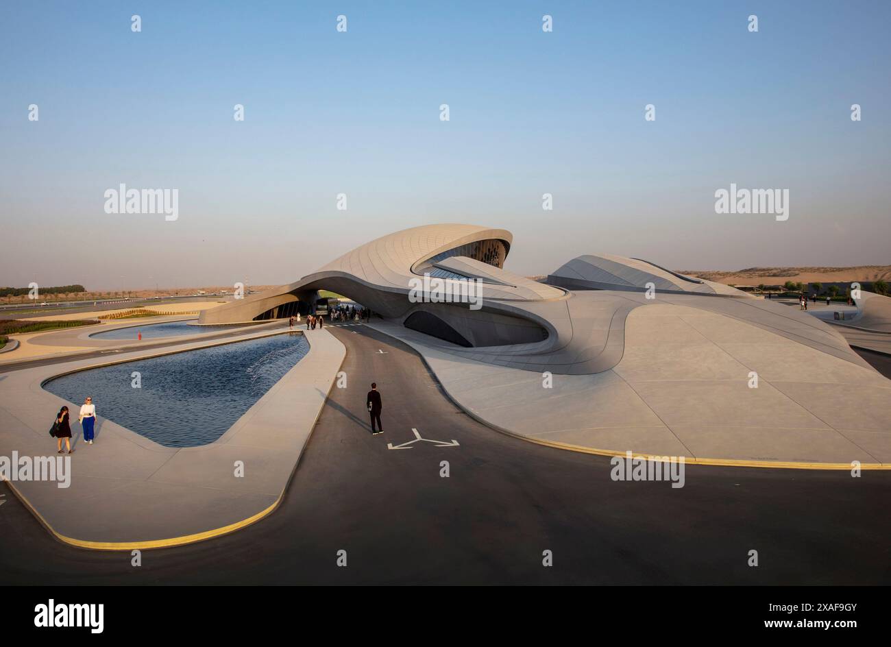 Ariel view of the main building with people walking along the path ...