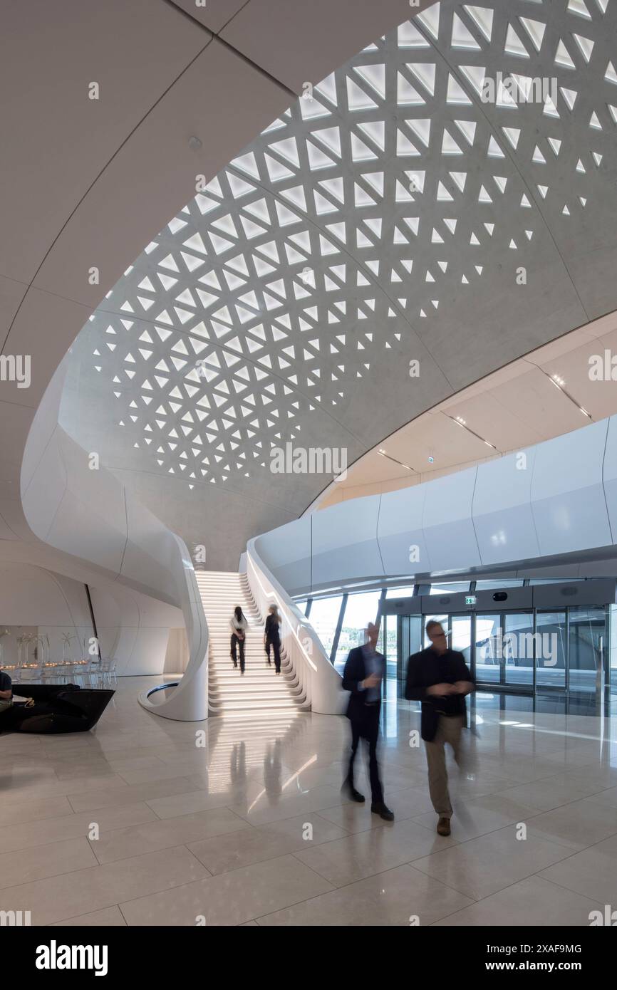 People standing in the main reception area. BEEAH Headquarters, Sharjah ...