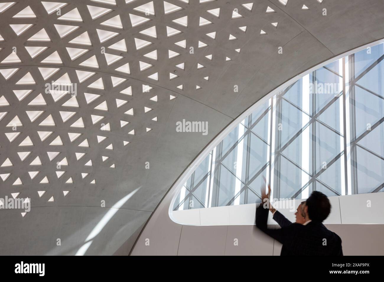 Someone taking a picture of the roof lighting design. BEEAH ...