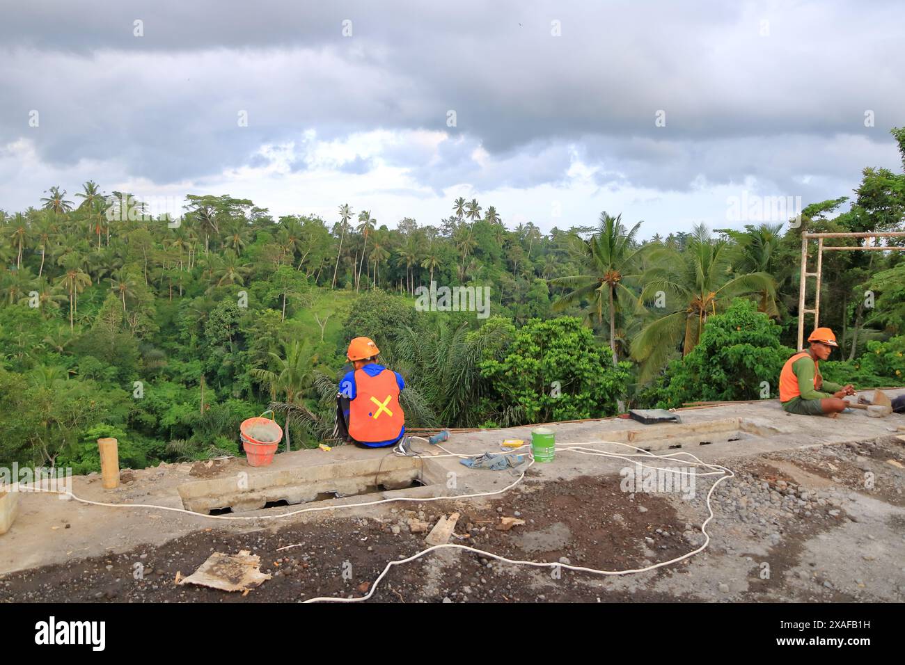Bali in Indonesia - January 31 2024: construction workers building ...