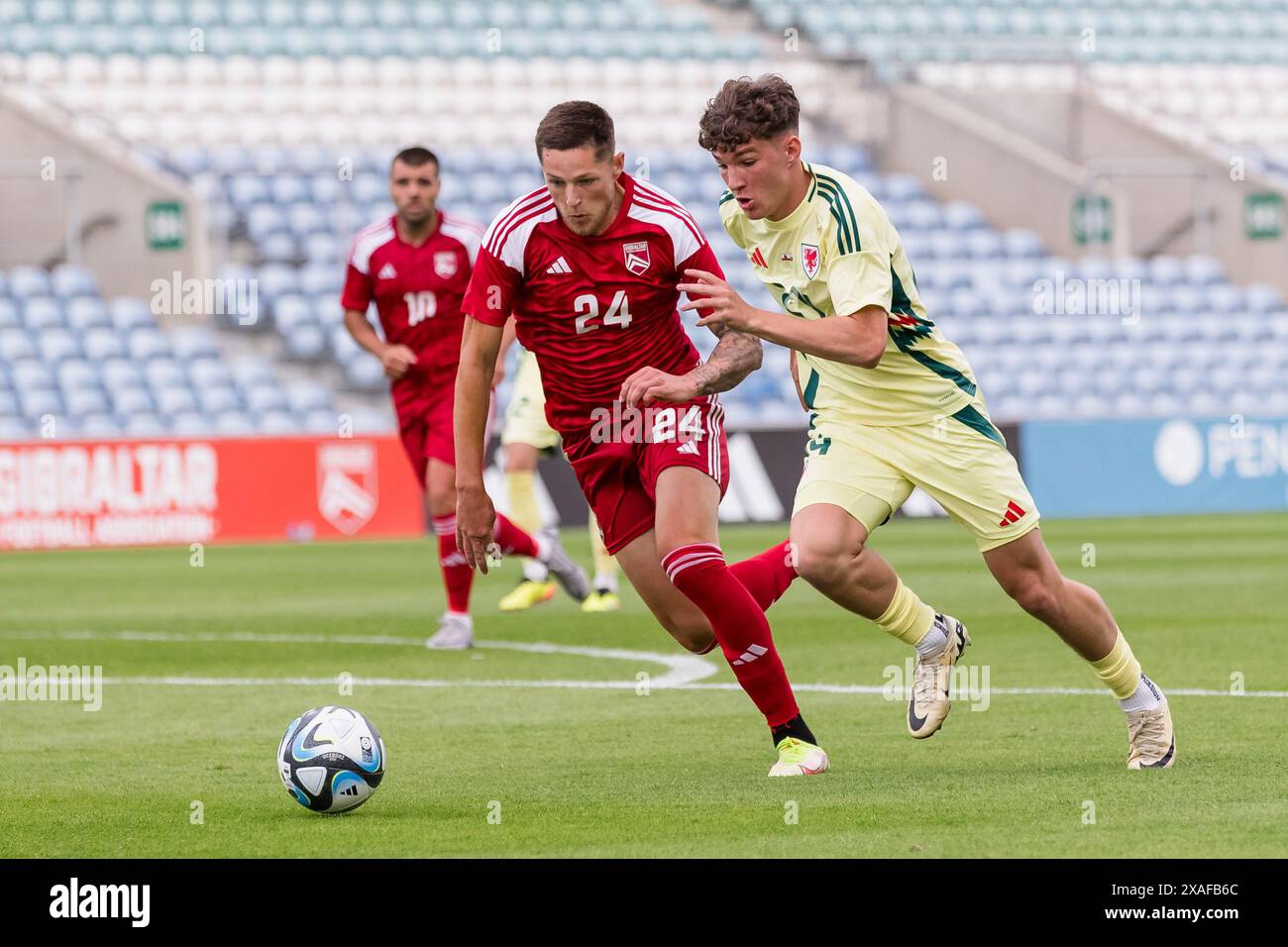 ALGARVE, PORTUGAL - 06 JUNE 2024: Wales' Lewis Koumas and Gibraltar's ...