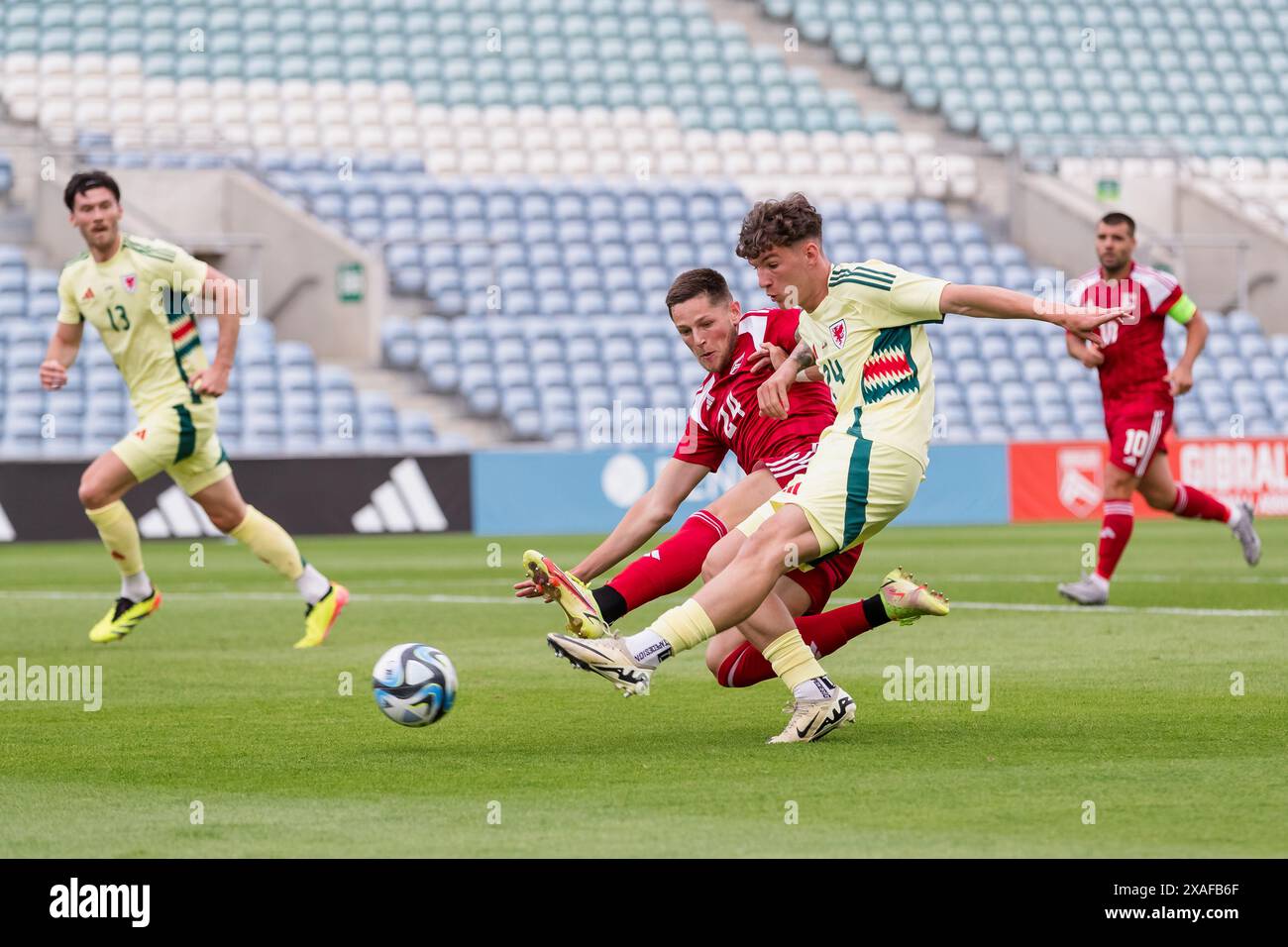 ALGARVE, PORTUGAL - 06 JUNE 2024: Wales' Lewis Koumas and Gibraltar's ...