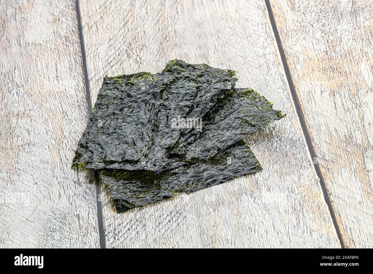 Korean nori seaweed chips heap snack Stock Photo - Alamy