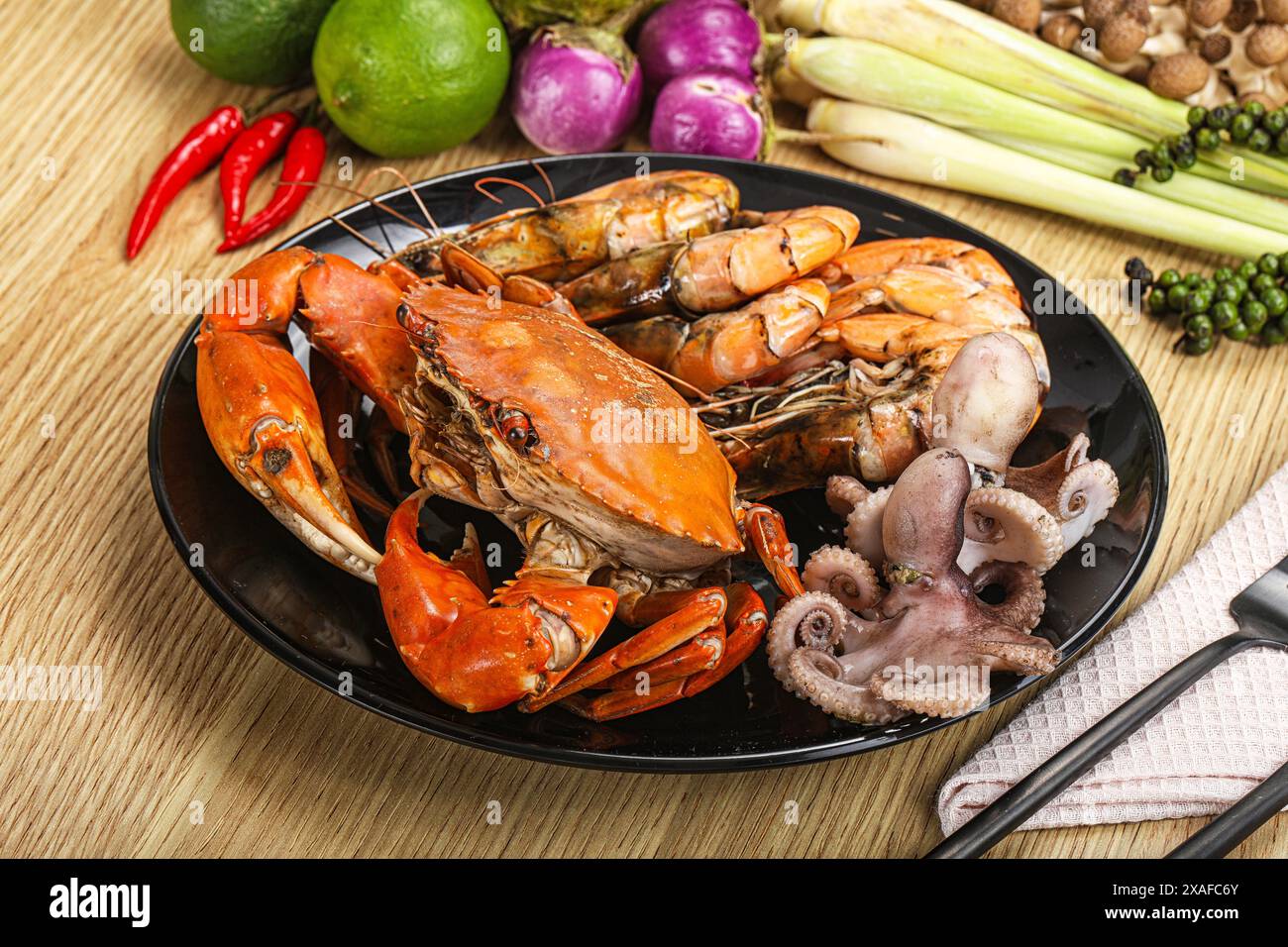 Luxury seafood mix - crab, tiger prawn, octopus Stock Photo - Alamy