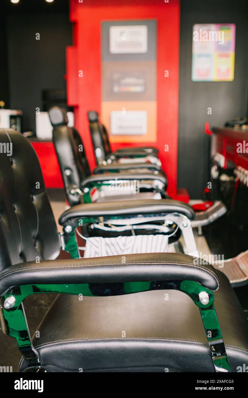 Barbershop. Barber working process with clients. Beard and hair ...