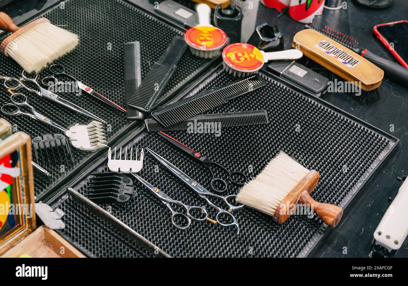 Barbershop. Barber working process with clients. Beard and hair trimming Stock Photo - Alamy