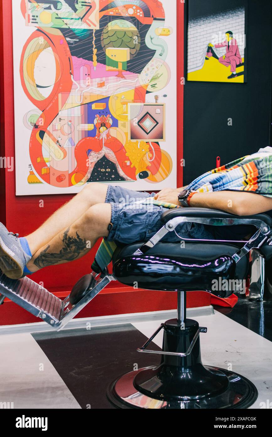 Barbershop. Barber working process with clients. Beard and hair trimming Stock Photo - Alamy