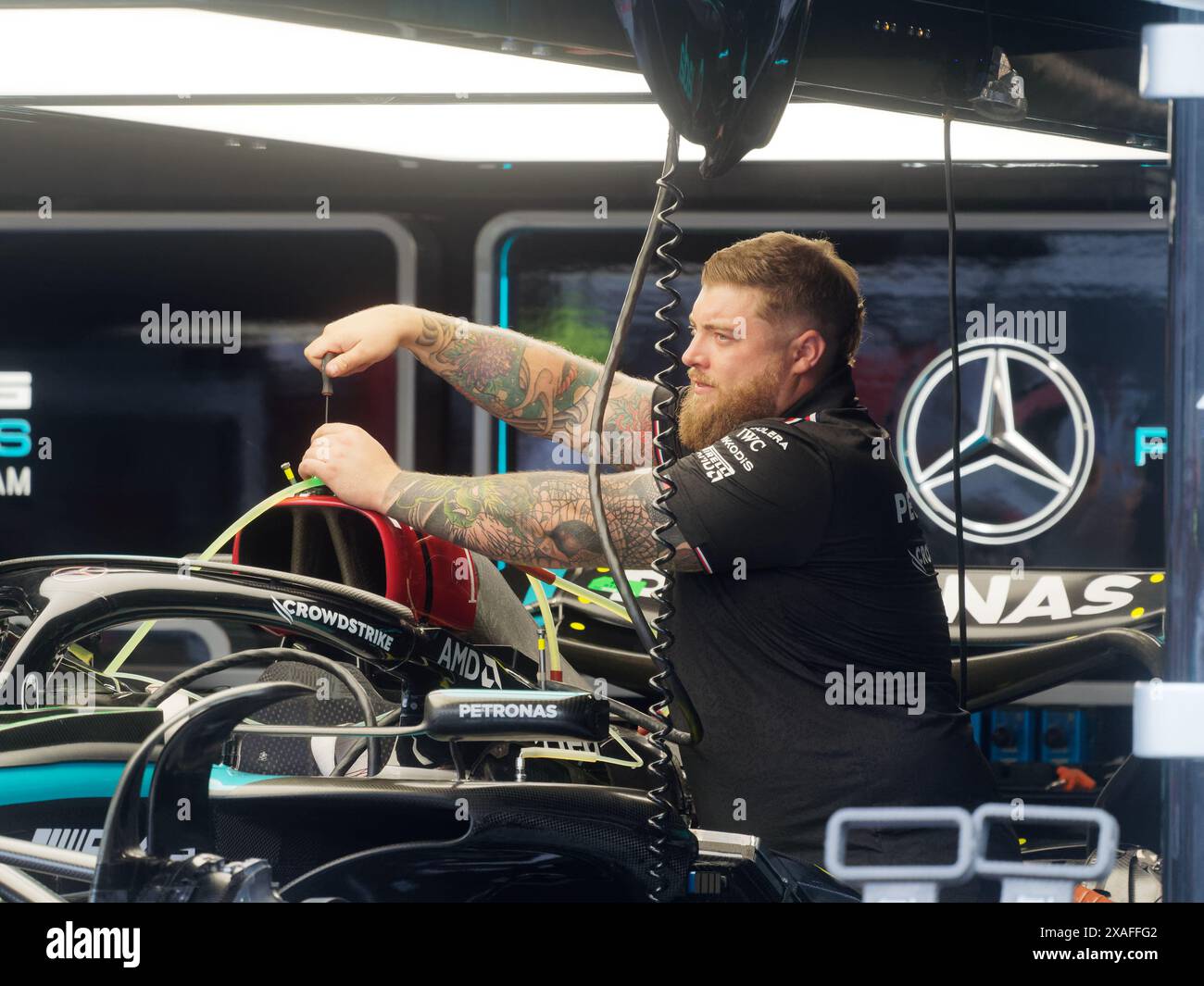 Montreal, Canada. 6 June 2024.Mercedes-AMG Petronas F1 team mechanic ...